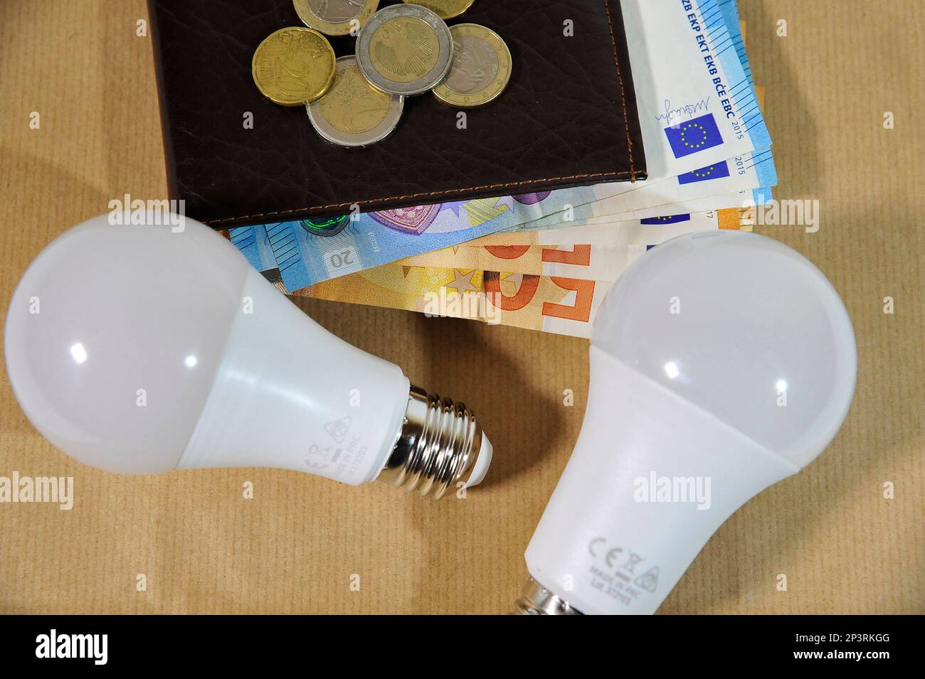 Rising cost of utilities, money for electricity Stock Photo - Alamy