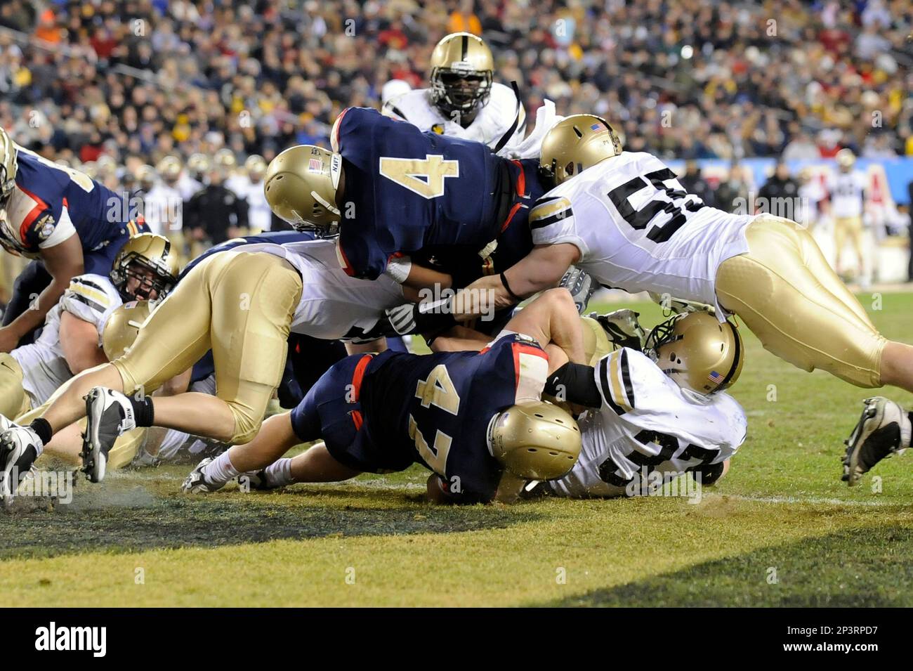 12 December 2009: Navy quarterback Ricky Dobbs (4) rushes for a ...
