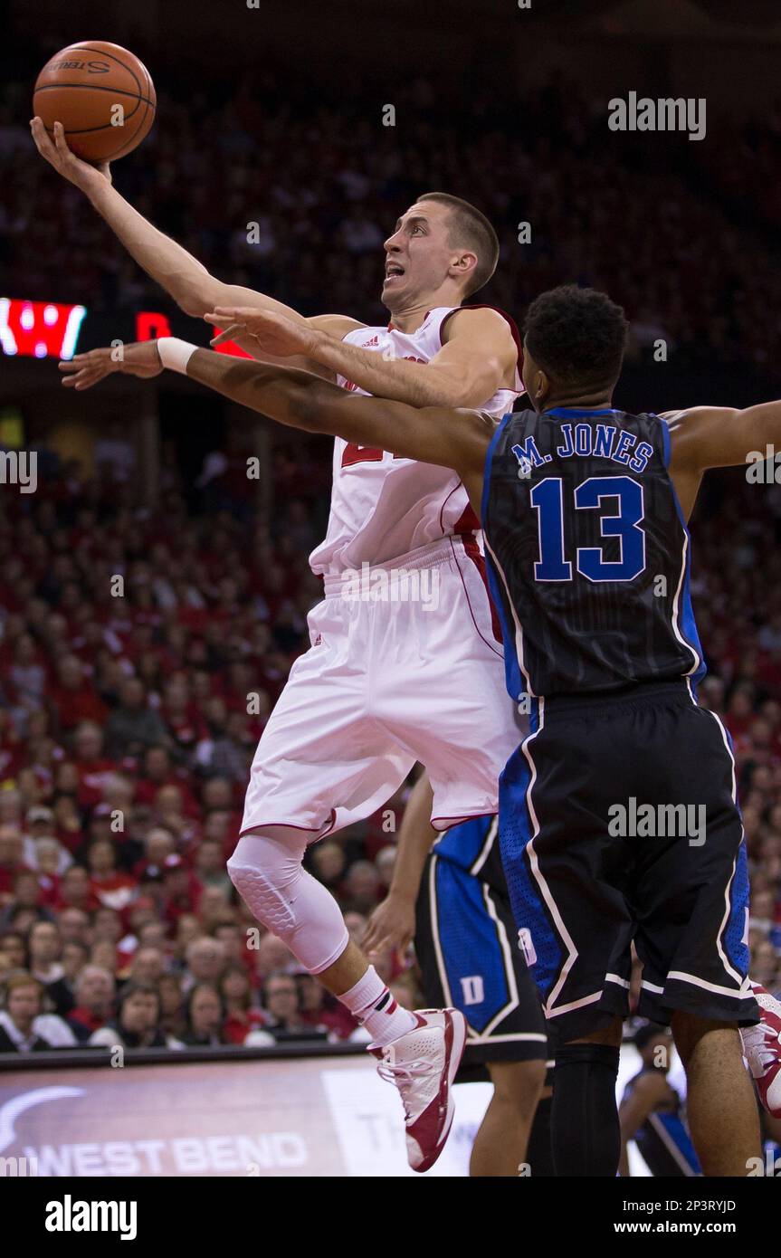 December 3, 2014: Wisconsin Badgers guard Josh Gasser #21 goes in for a ...