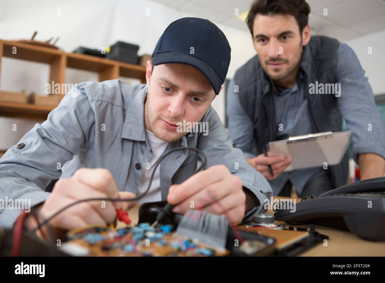 electronics student being assessed doing a practical examination Stock ...
