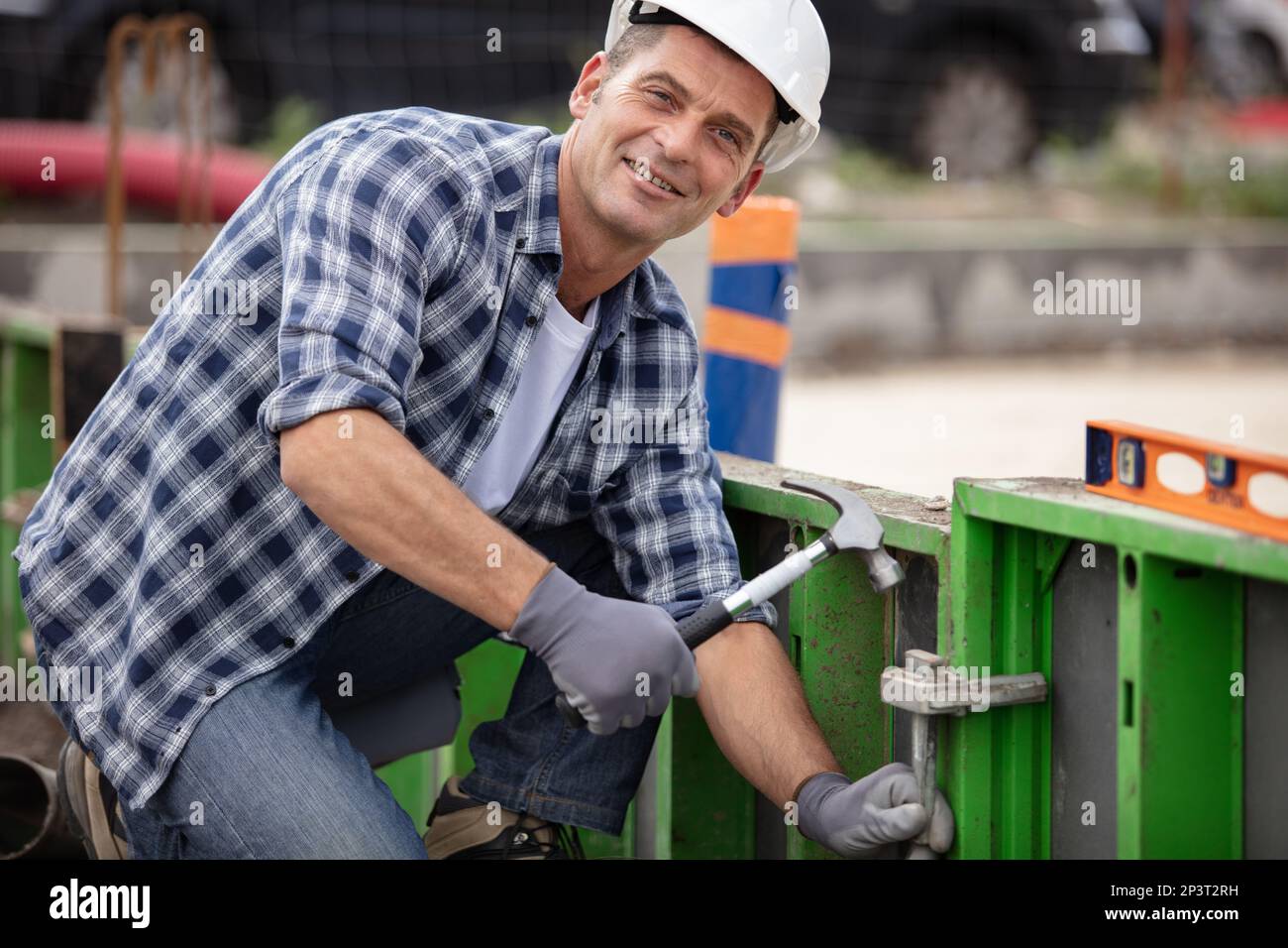 construction worker laying foundations at construction site Stock Photo ...