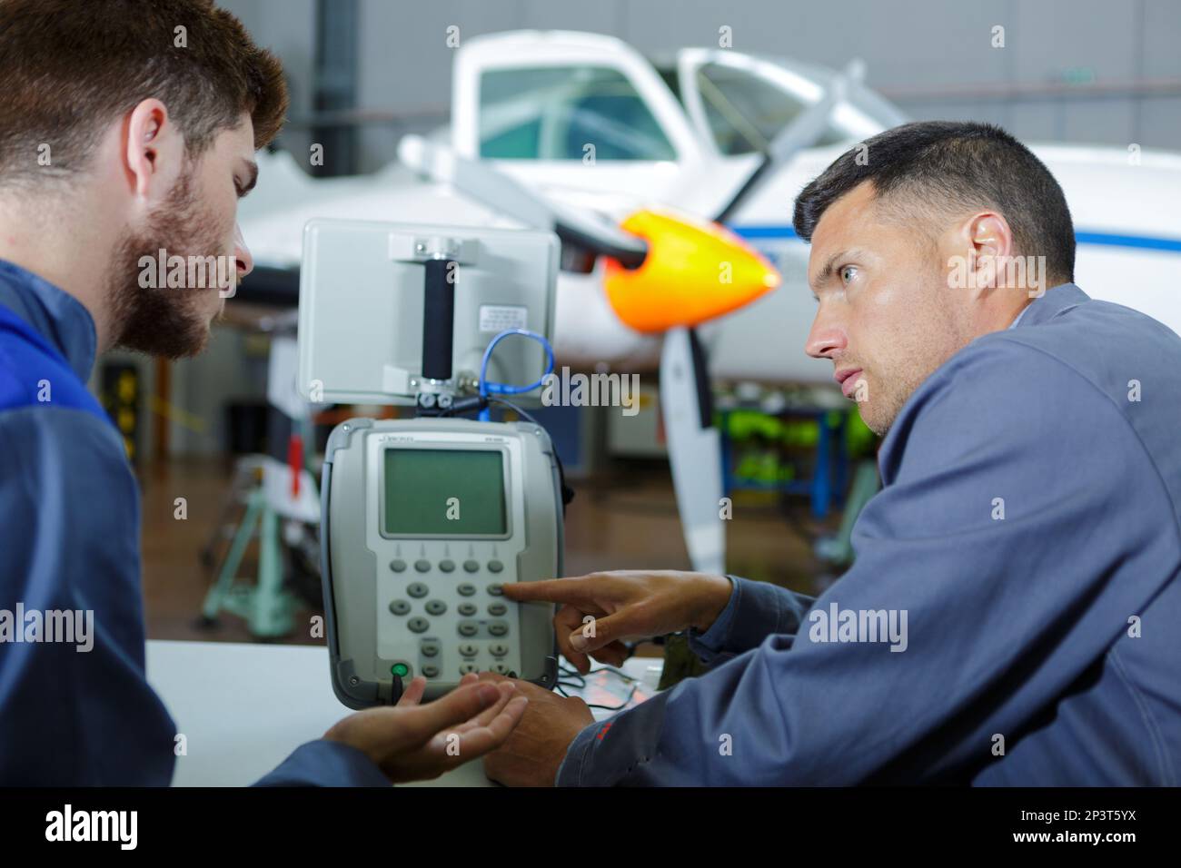 Man operating machines hi-res stock photography and images - Alamy