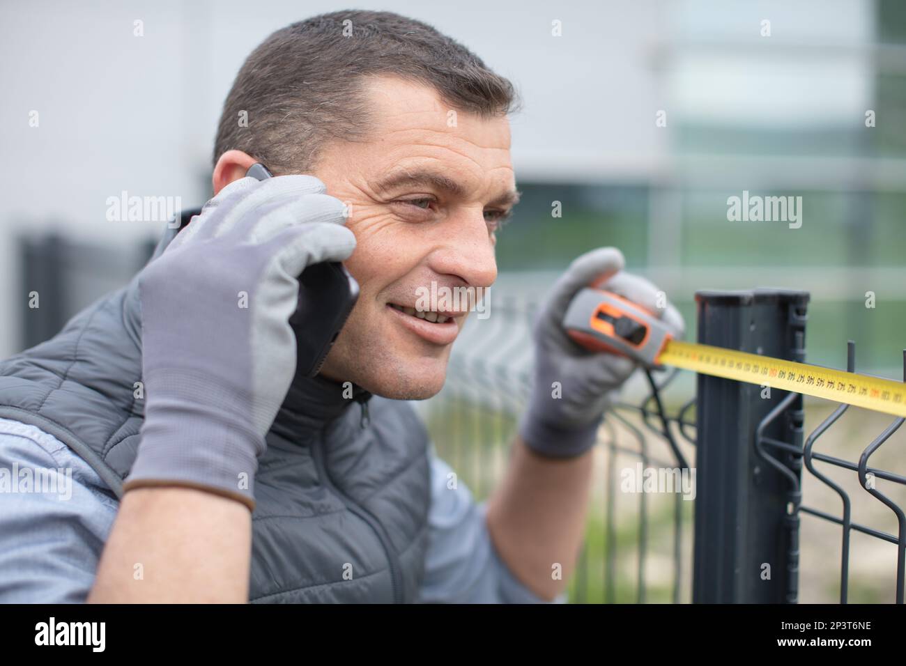 Measuring fence hi-res stock photography and images - Alamy