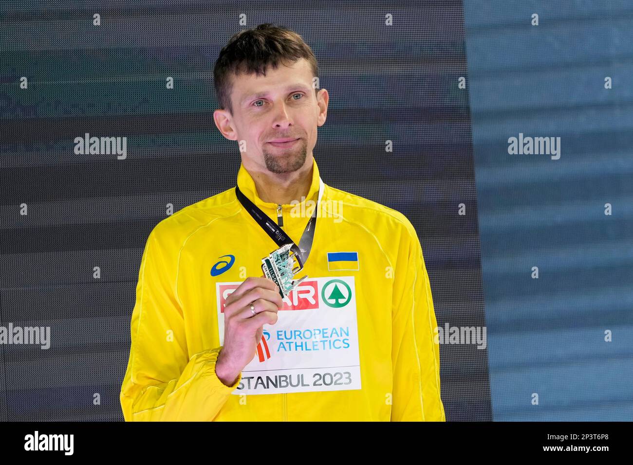 Andrii Protsenko, of Ukraine, poses with his silver medal on the podium of the Men High Jump at ...