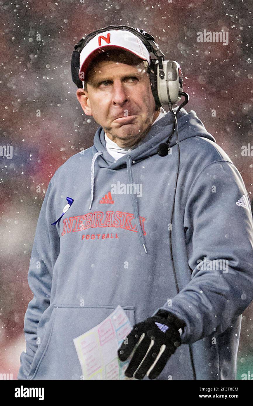 Nebraska head coach Bo Pelini paces in the snow during the third ...
