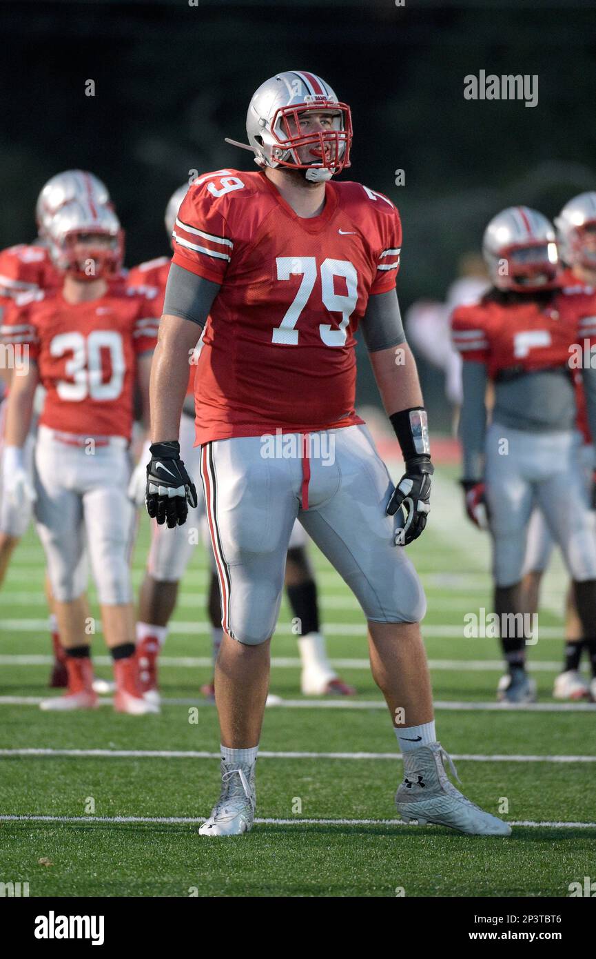 Lake Mary offensive lineman Zack Sharp (79) stands on the field before ...