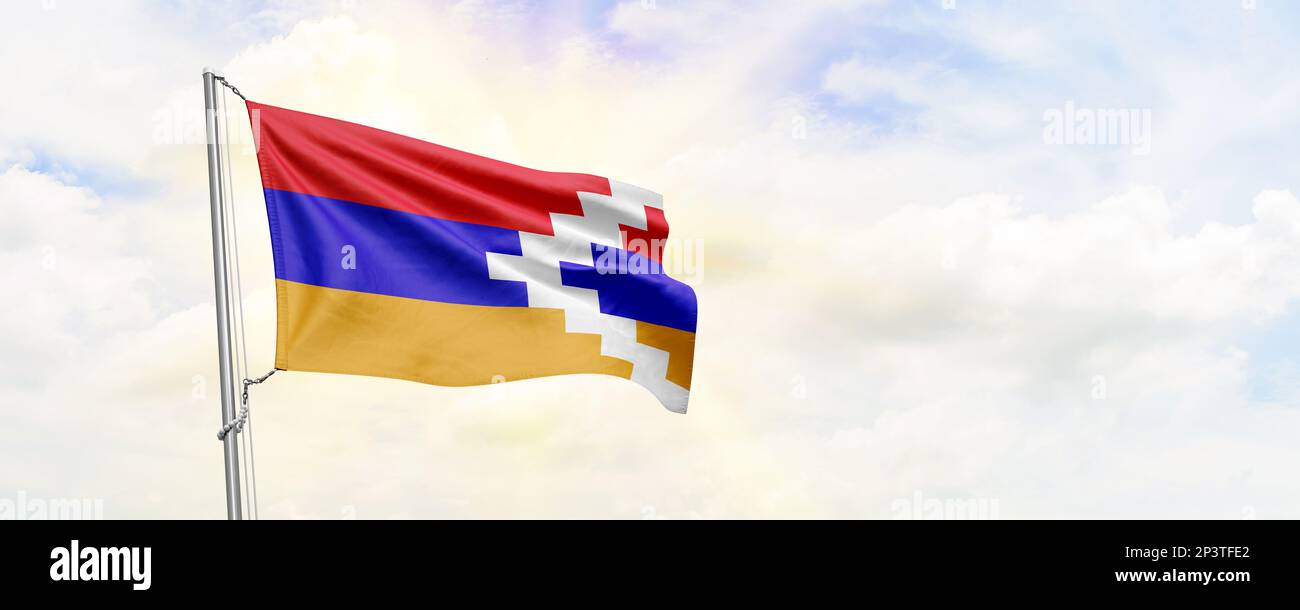 Nagorno-Karabakh Republic flag waving on sky background. 3D Rendering Stock Photo - Alamy