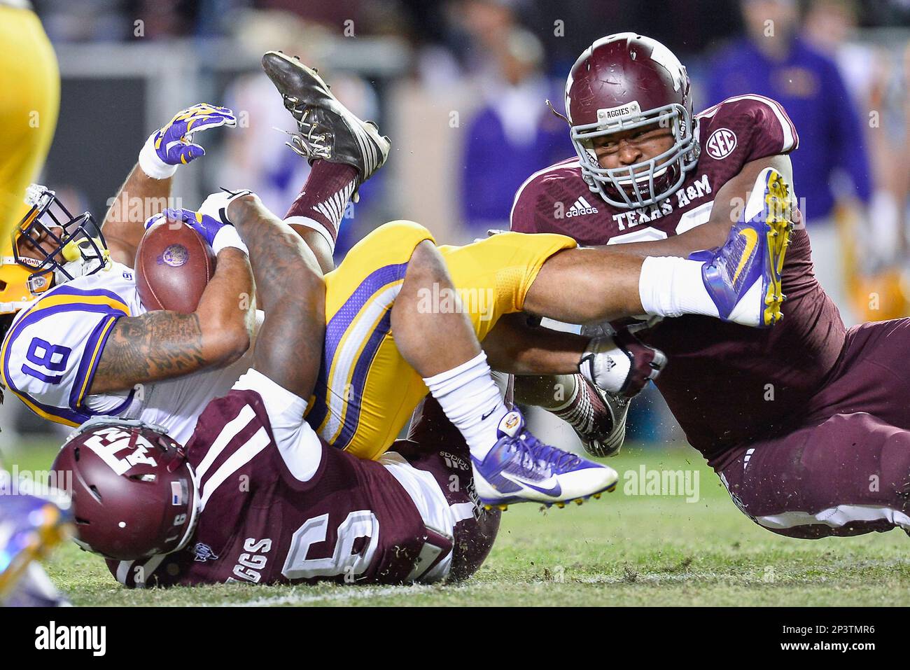 Texas A&M linebacker Donnie Baggs (16) brings down LSU running back ...