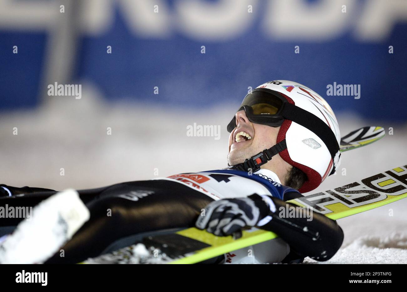 Switzerland's Simon Ammann reacts to his victory in the Ski Jumping HS ...