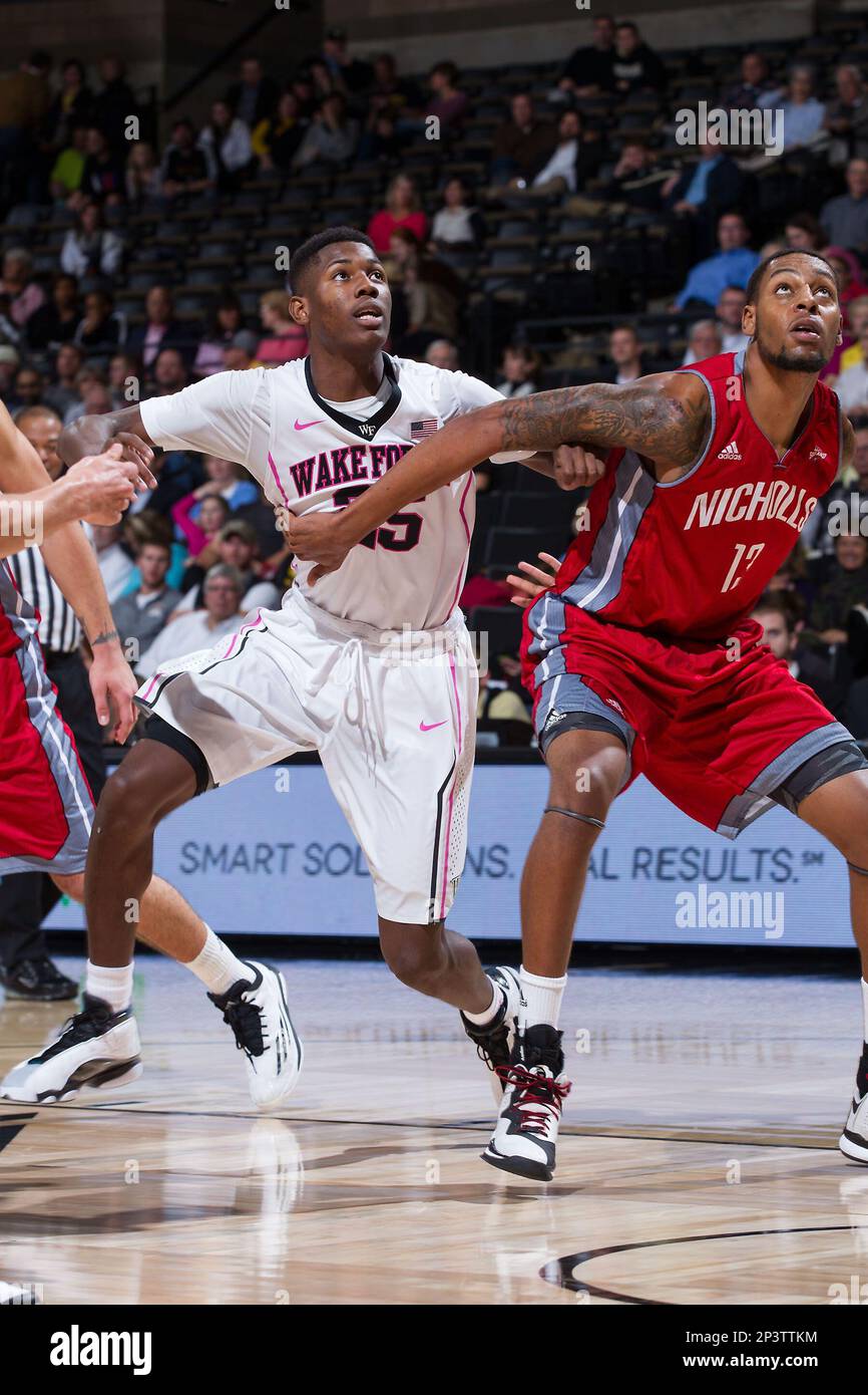 Cornelius Hudson (25) of the Wake Forest Demon Deacons works for ...