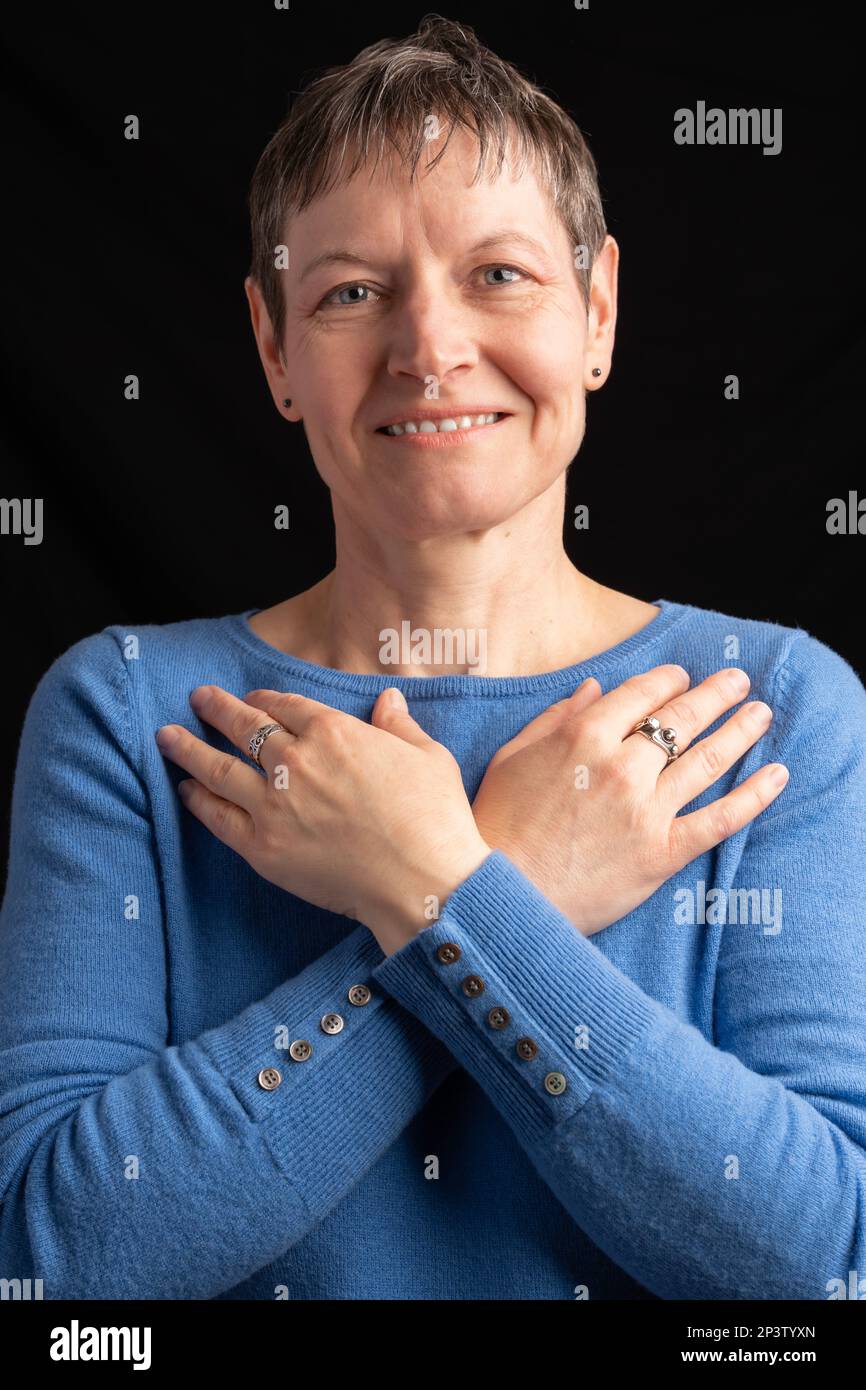 Woman fist chest isolated hi-res stock photography and images - Alamy