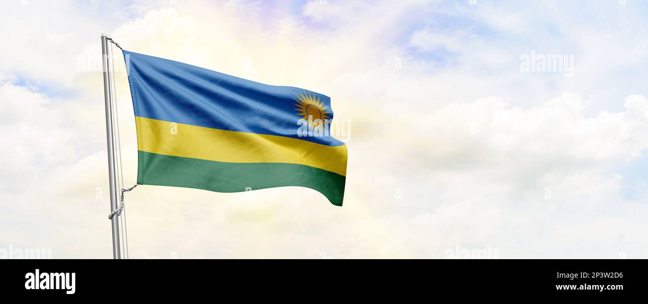 Rwanda flag waving on sky background. 3D Rendering Stock Photo - Alamy