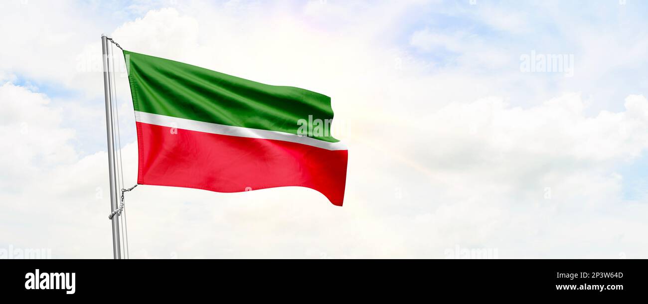 Tatarstan flag waving on sky background. 3D Rendering Stock Photo - Alamy
