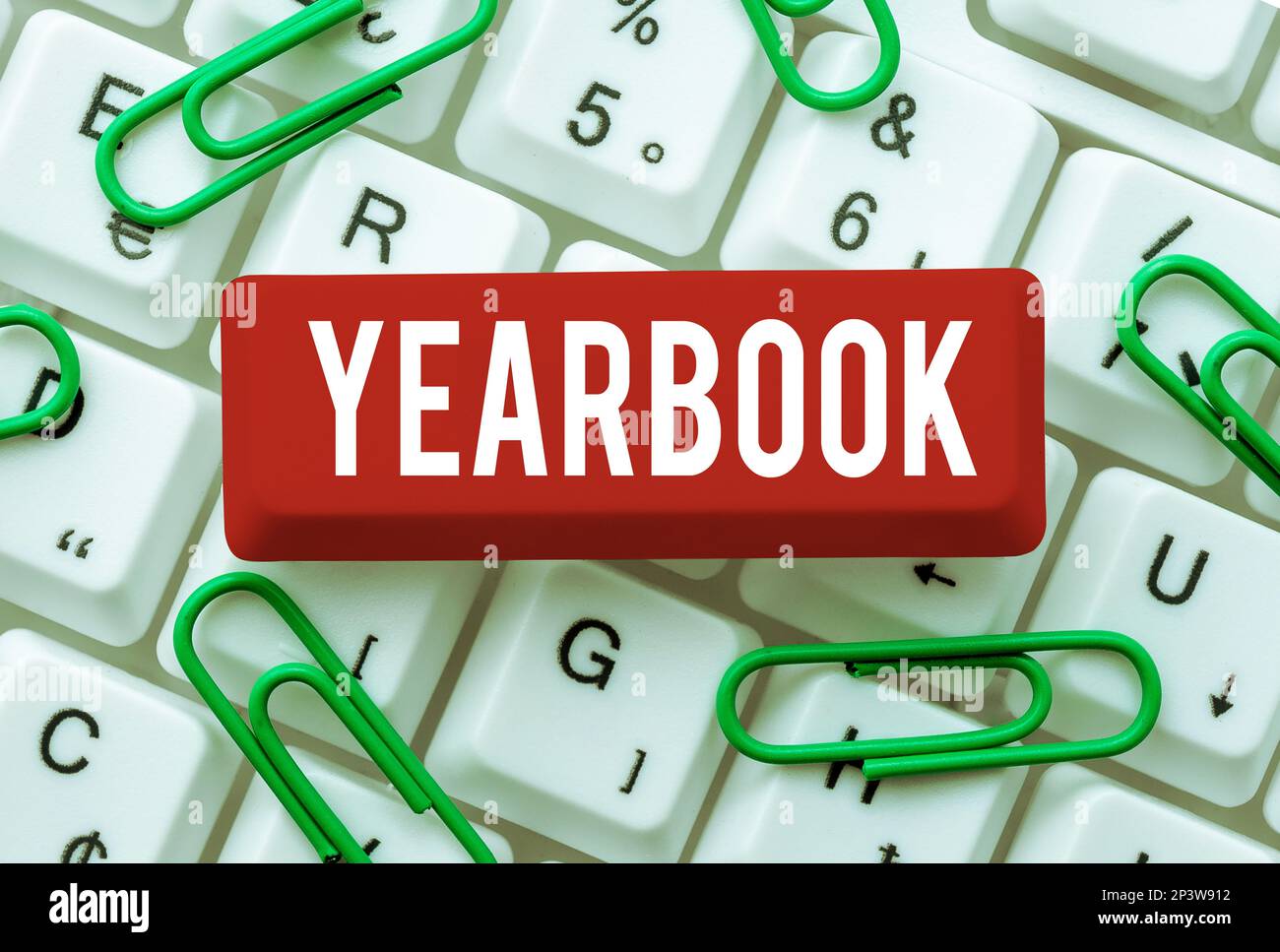 Sign displaying Yearbook. Word for publication compiled by graduating ...