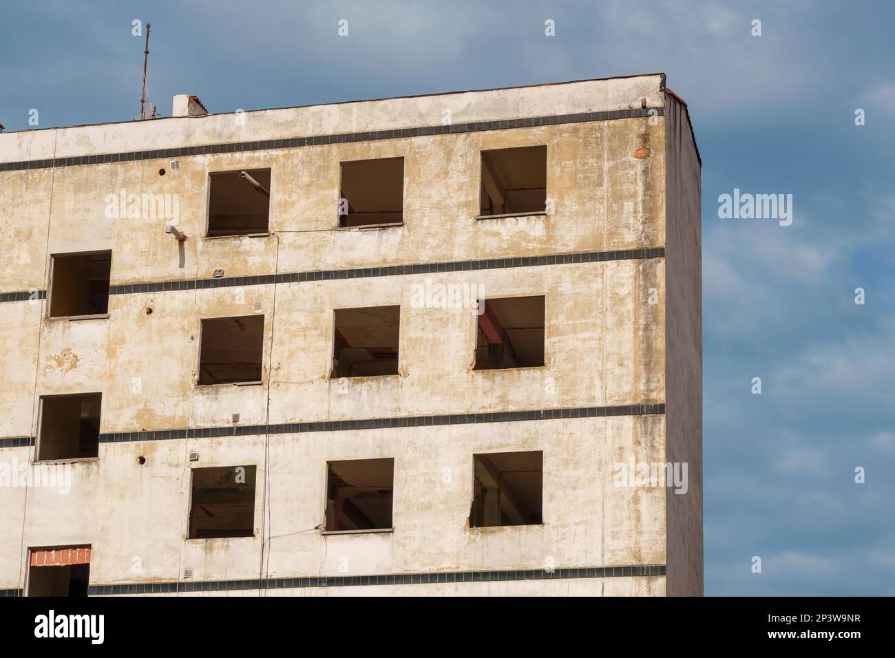 A ruined house with broken collapsed empty windows Stock Photo - Alamy