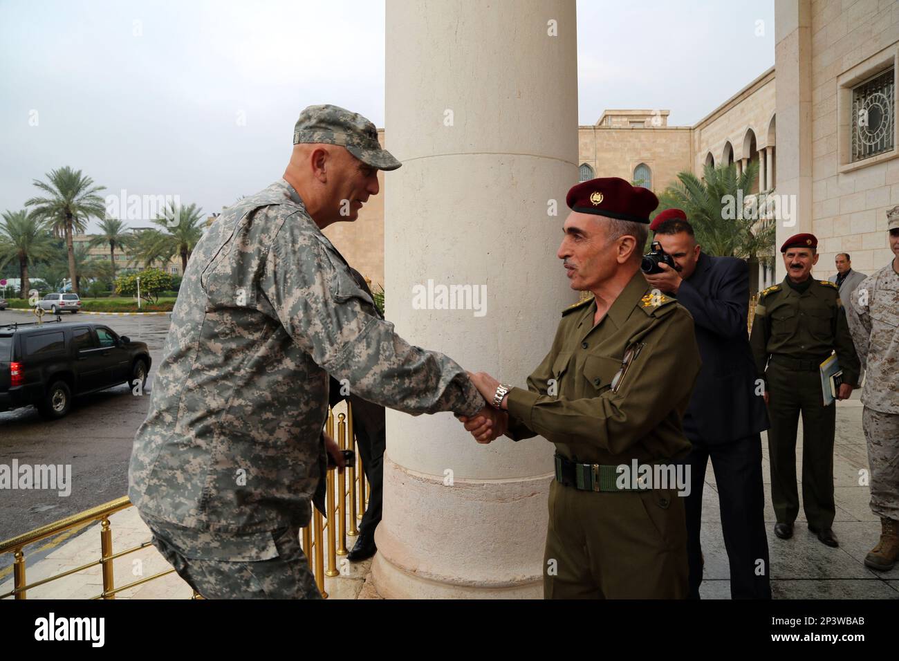 U.S. Army Chief of Staff Gen. Raymond Odierno, left, greets Iraqi Army Chief of Staff Gen ...