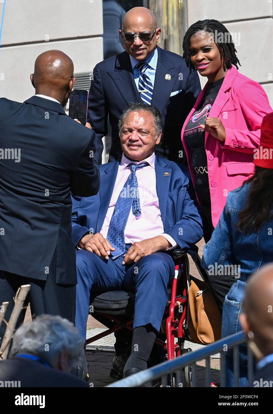 The Rev. Jesse Jackson, seated, smiles for a photo after arriving to ...