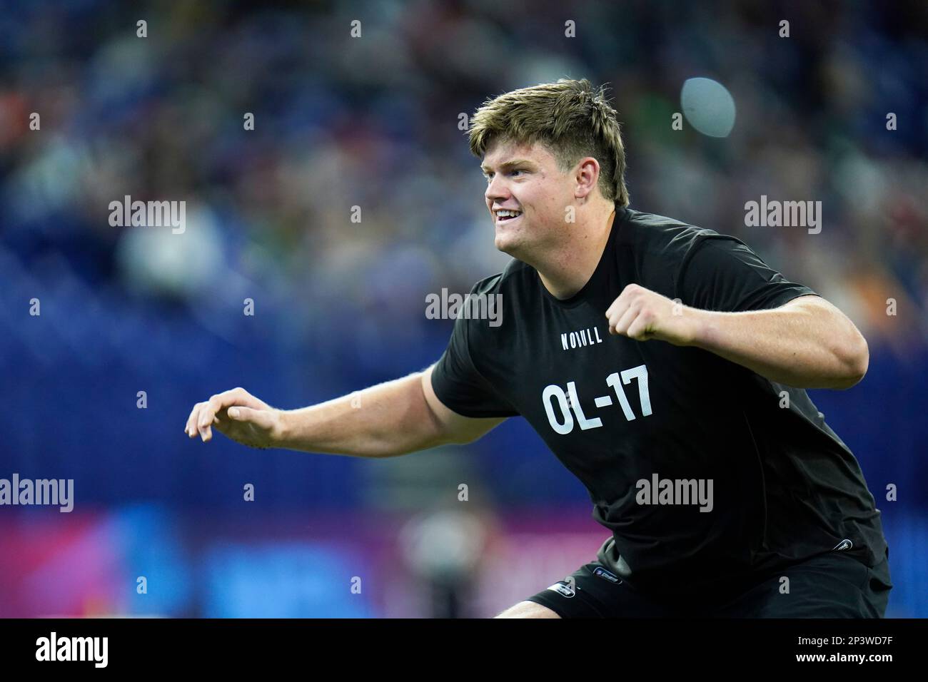 BYU offensive lineman Blake Freeland runs a drill at the NFL football ...