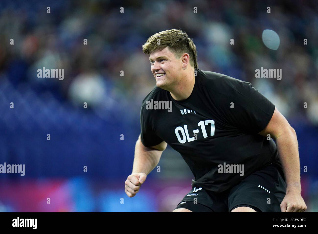 BYU offensive lineman Blake Freeland runs a drill at the NFL football ...