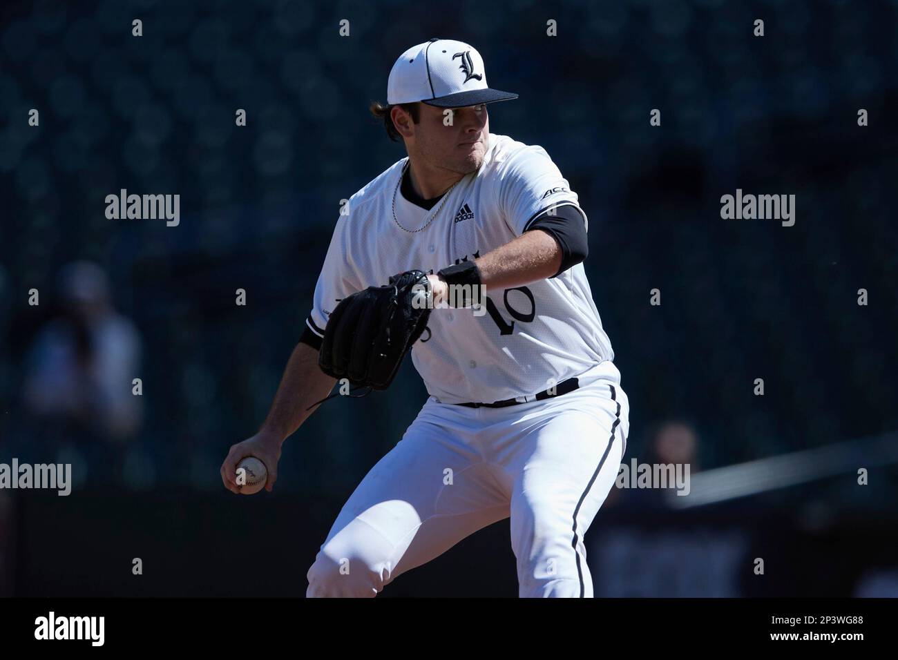 Louisville Cardinals starting pitcher Carson Liggett (10) in action ...