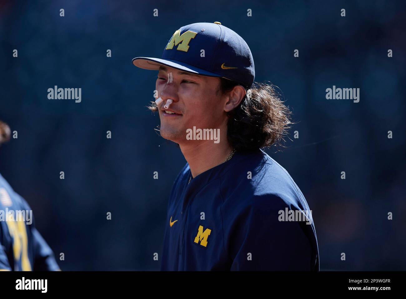 Jake Marti (7) of the Michigan Wolverines supports his team prior to ...