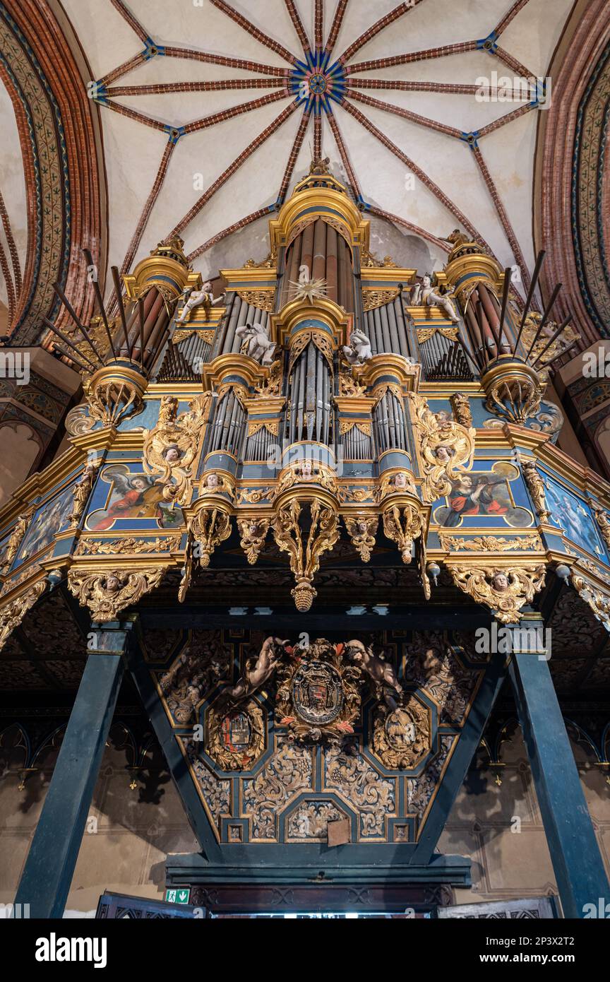 Visitors in cathedral listening to organs concert. Classified in the ...