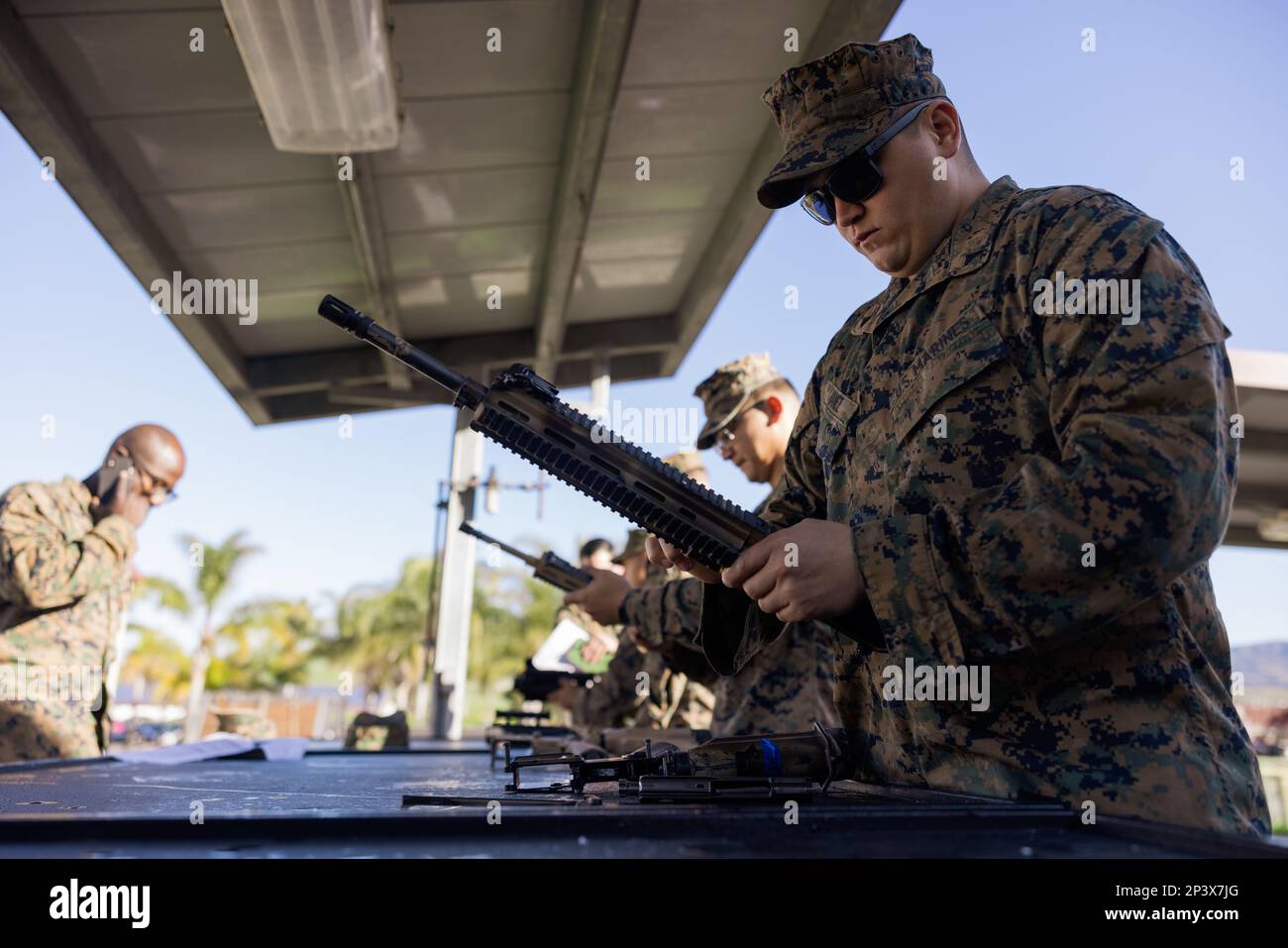 U.S. Marine Lance Cpl. Andrew Yanez, a rifleman with Kilo Company, 3rd ...