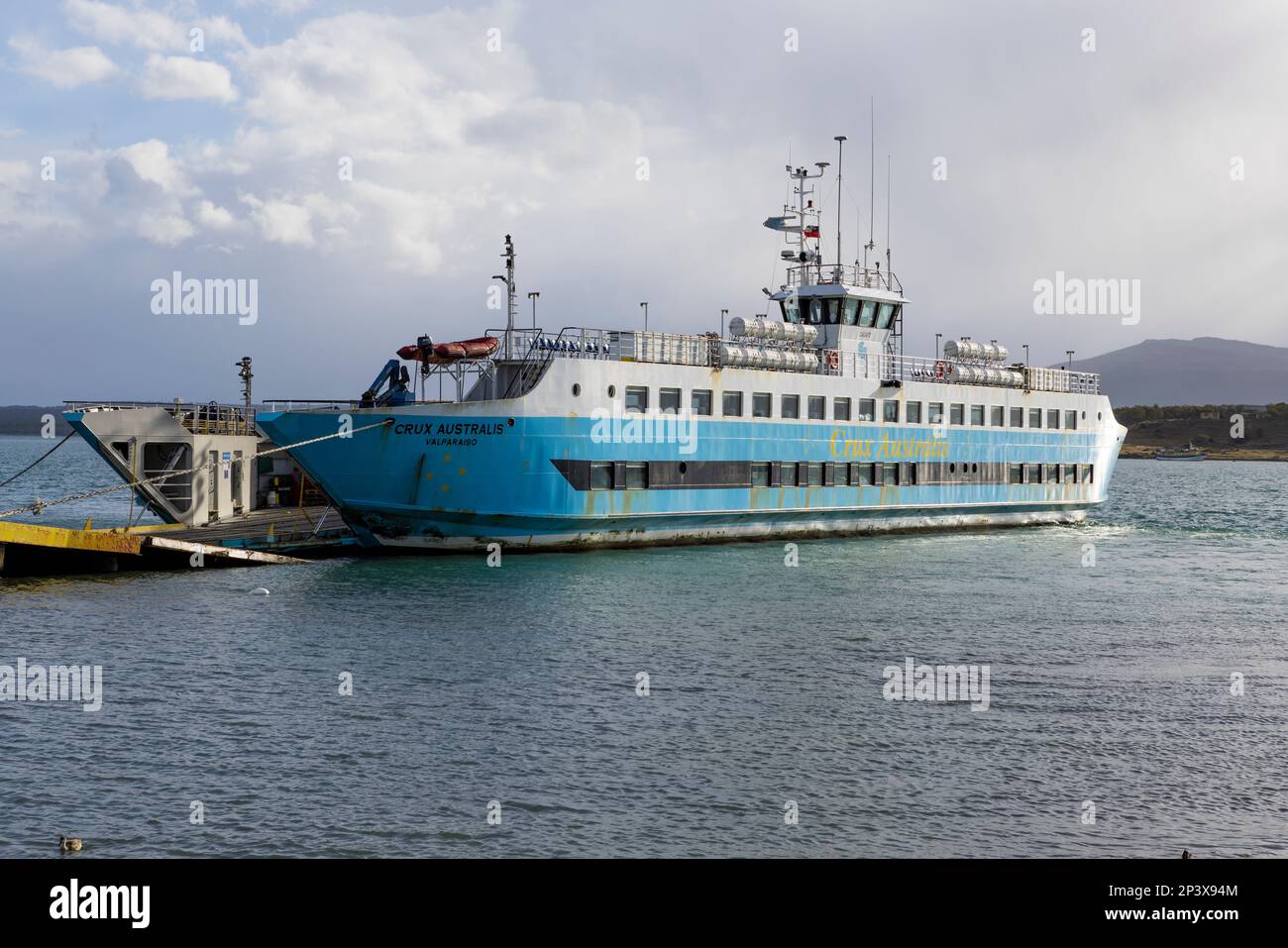 Blue and white ferry at the port of Puerto Natales, Patagonia, Chile ...