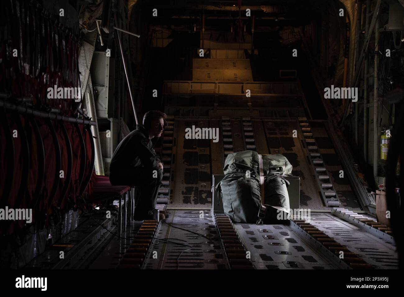 U.S.Marine Corps Cpl. Tyler Bearden, a fixed-wing aircraft load master ...