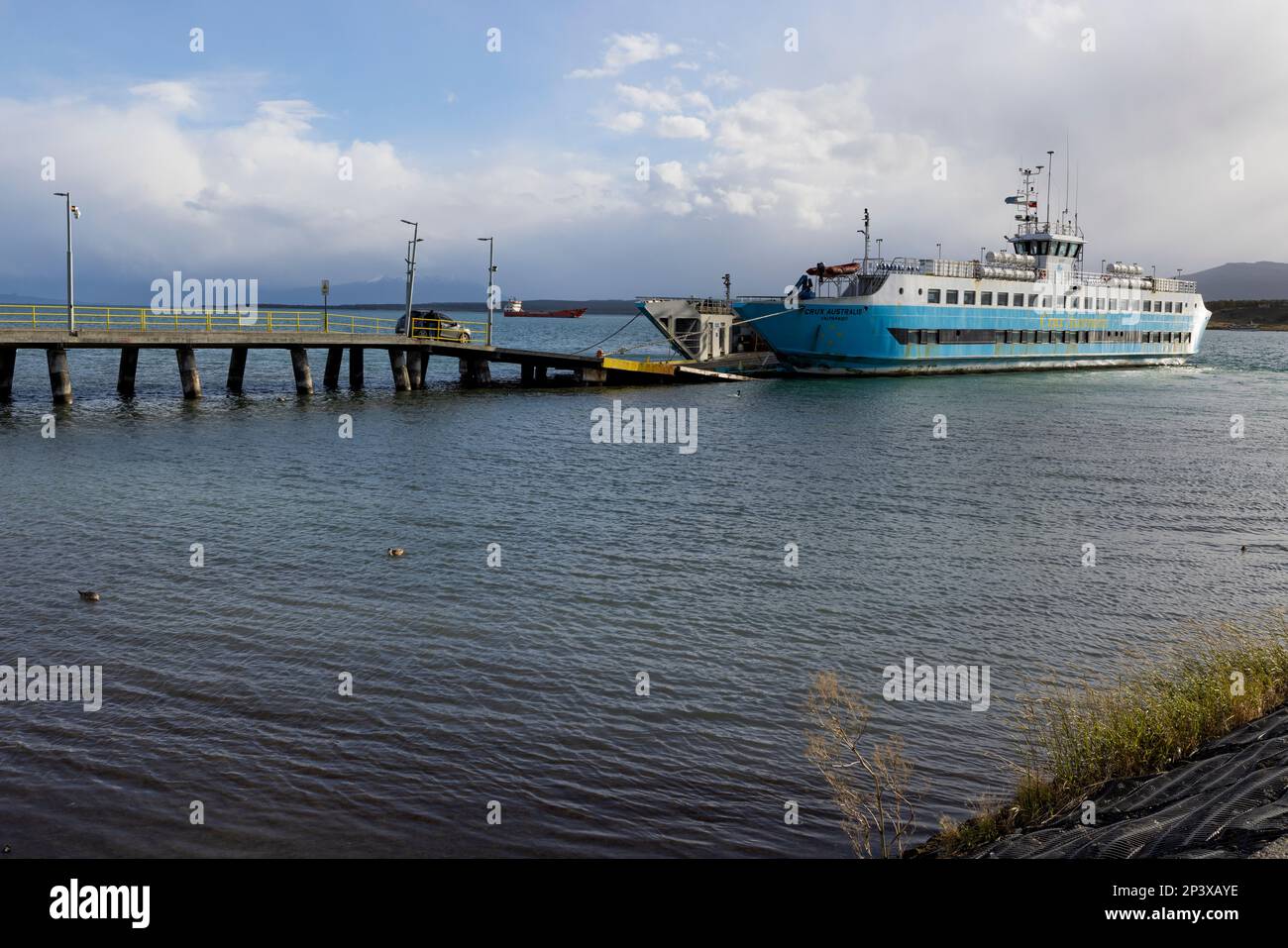 Blue and white ferry at the port of Puerto Natales, Patagonia, Chile ...