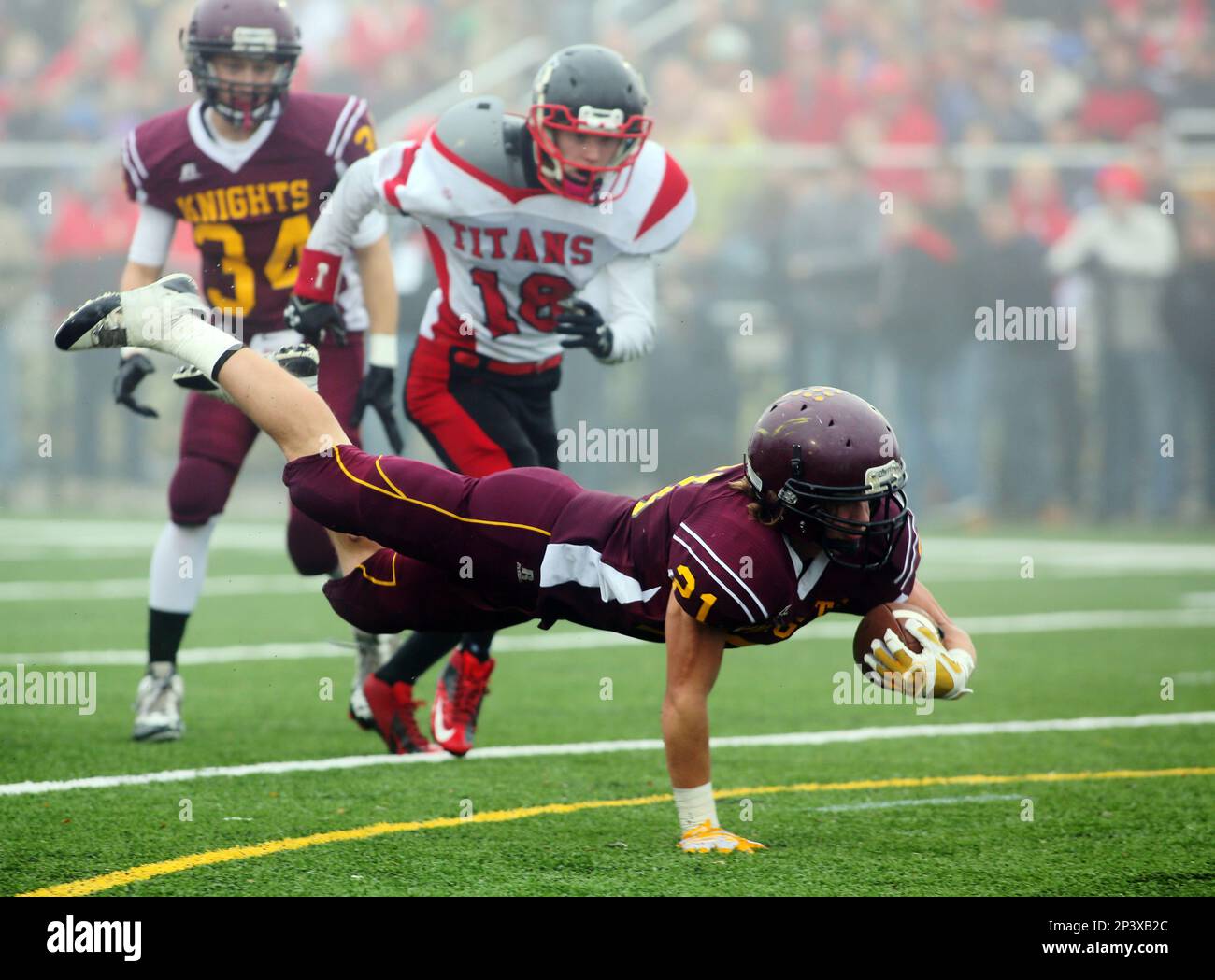 Victoria's Bryan Dome (21) flies down to the 2-yard-line past Attica ...