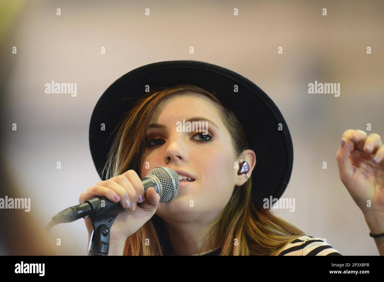 Echosmith lead singer Sydney Sierota sings to South Lenoir High School students Friday, Nov. 21 ...