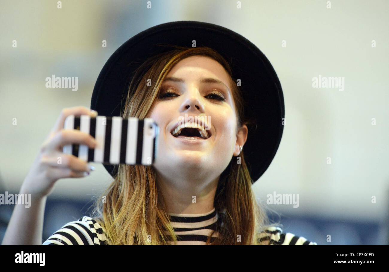 Echosmith lead singer Sydney Sierota takes a photo of South Lenoir High ...