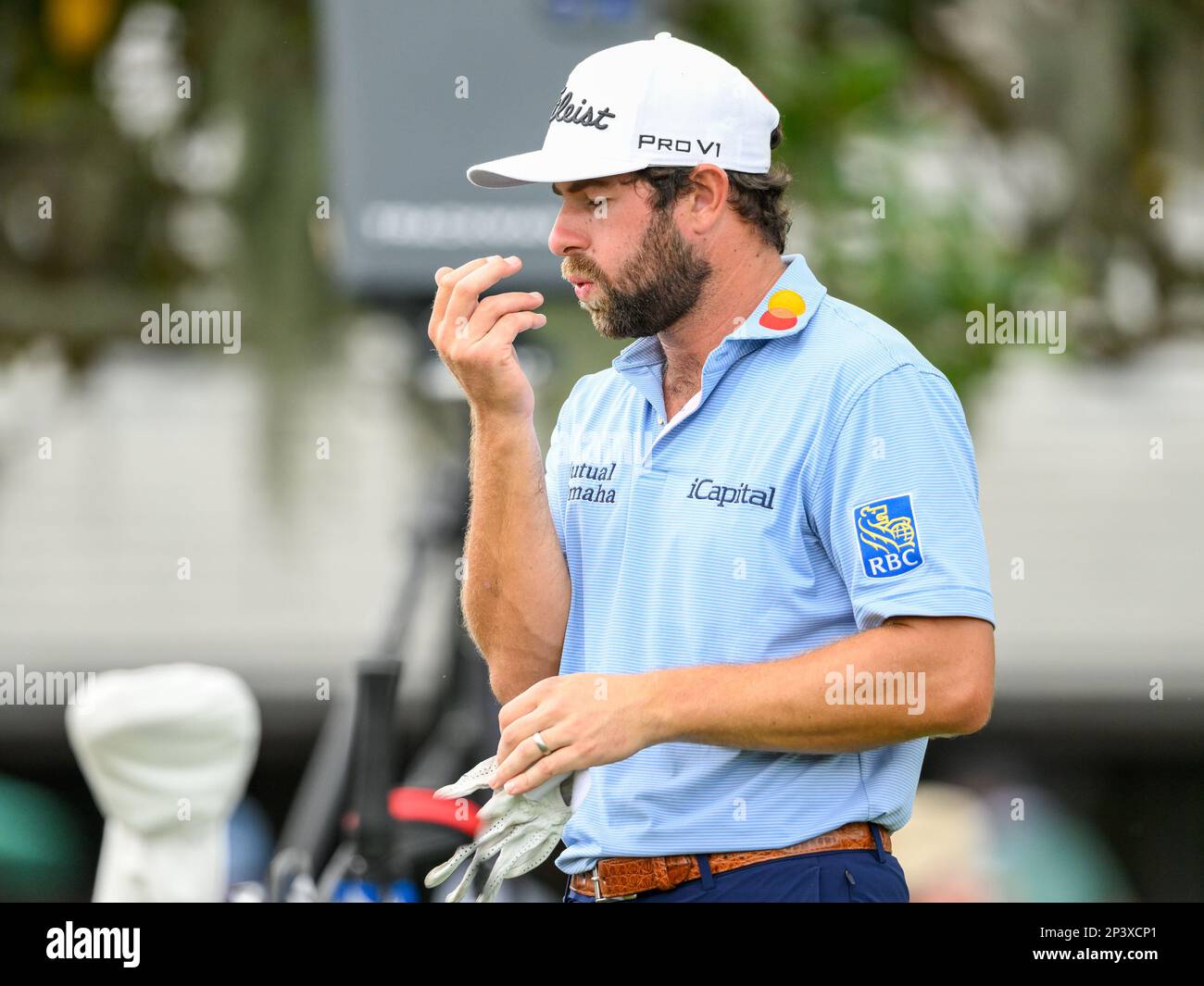 Orlando, FL, USA. 5th Mar, 2023. Cameron Young blows his fingers to dry ...
