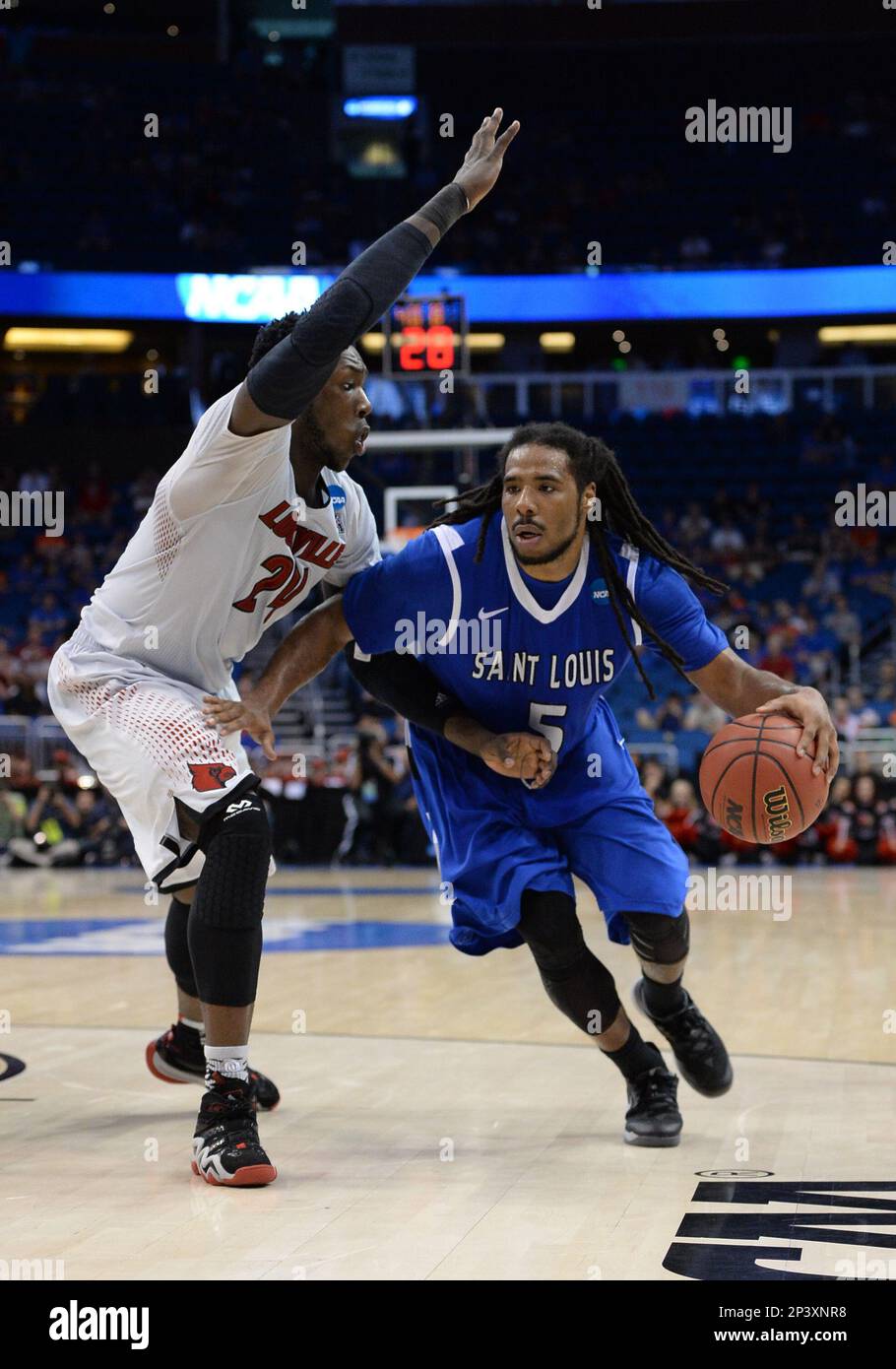 22 March 2014: G Jordair Jett (5) of the Saint Louis Billikens drives ...