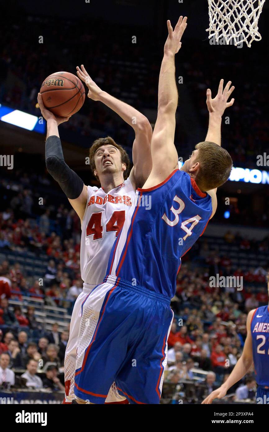 20 March 2014: Wisconsin Badgers forward Frank Kaminsky (44) battles ...