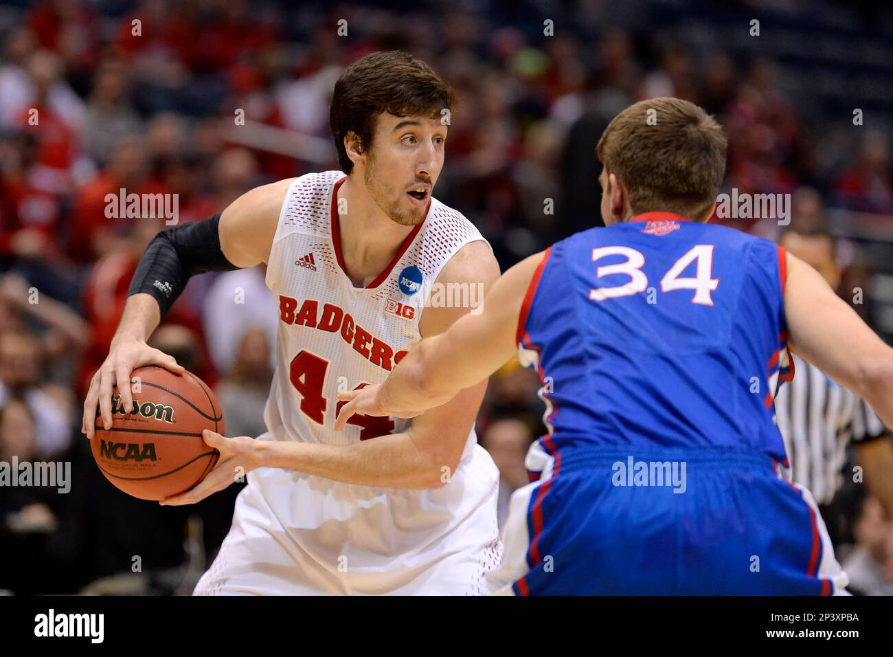20 March 2014: Wisconsin Badgers forward Frank Kaminsky (44) battles ...