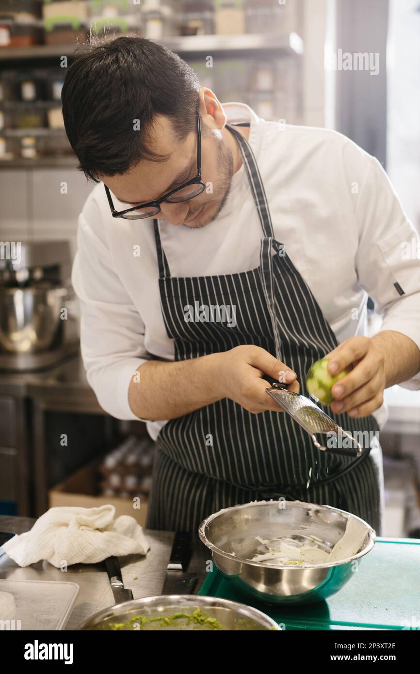 The middle section is a portrait of a chef grating lime zest. The ...