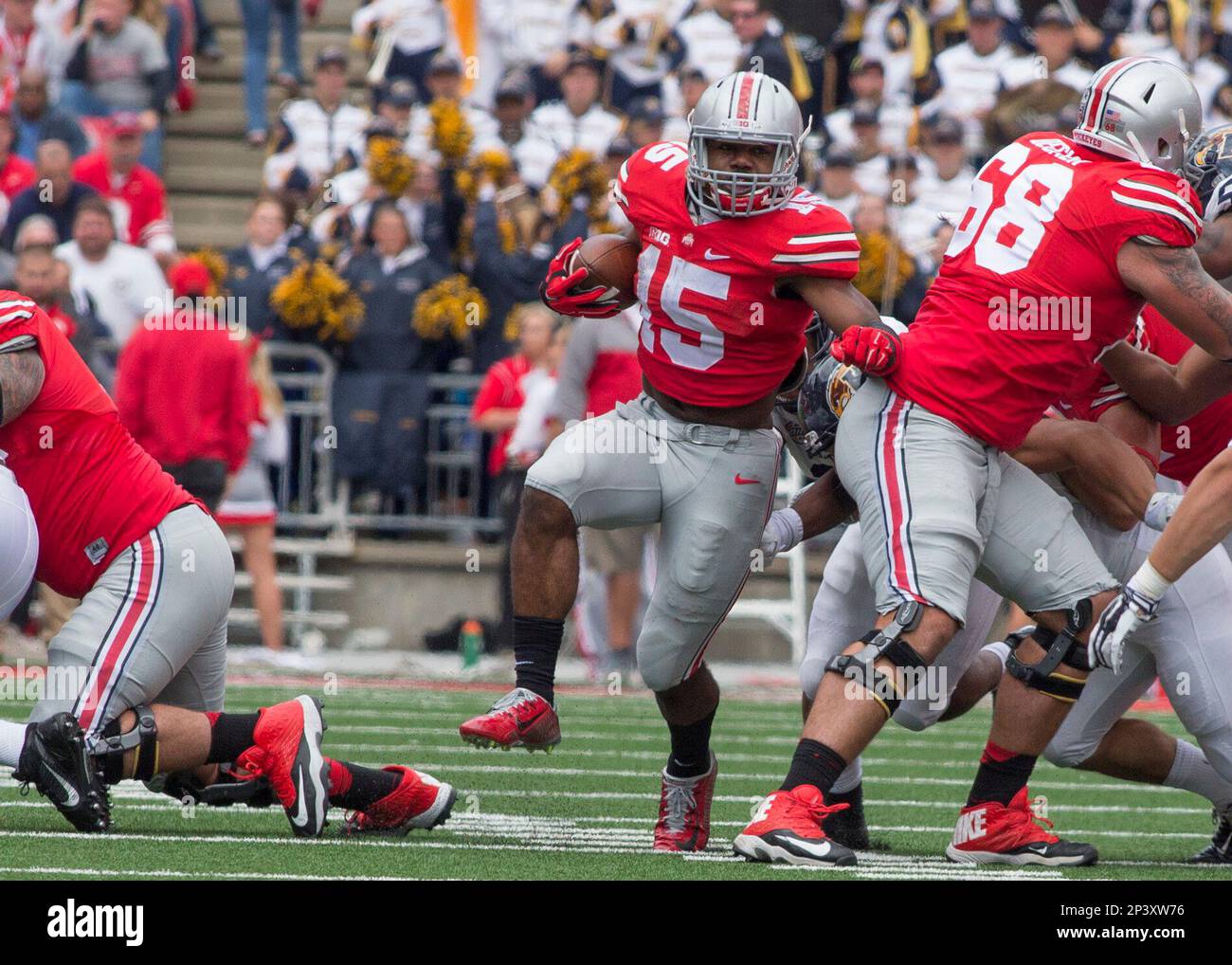 13 September 2014: Running back Ezekiel Elliott (15) of the Ohio State ...