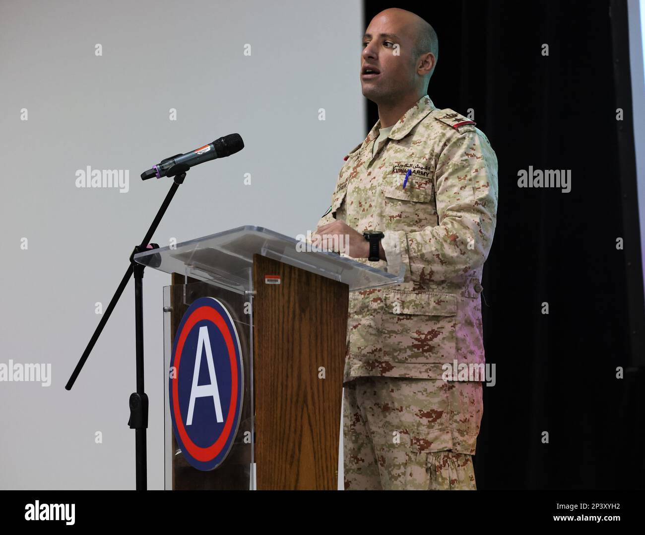 Lt. Col. Talal Bushehri presents the lecture. To commemorate the 32nd ...