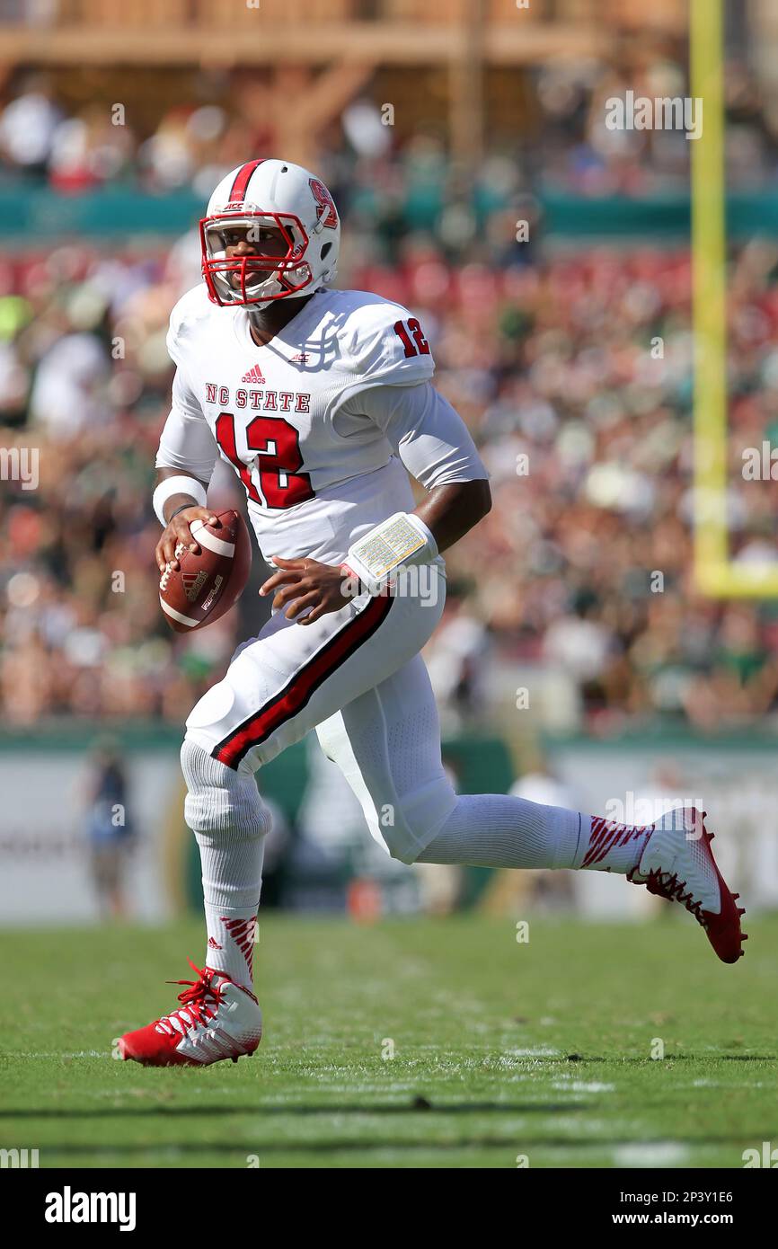 13 SEP 2014: NC State's Jacoby Brissett (12) in action during the game ...