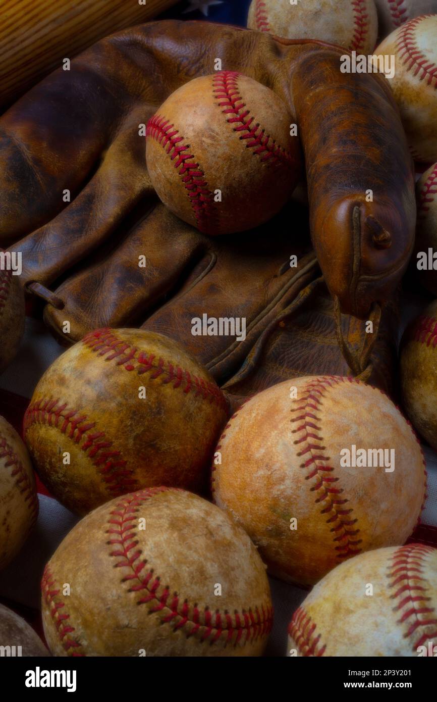 Weathered Old Lovely Mitt And Beat Up Baseballs Stock Photo - Alamy