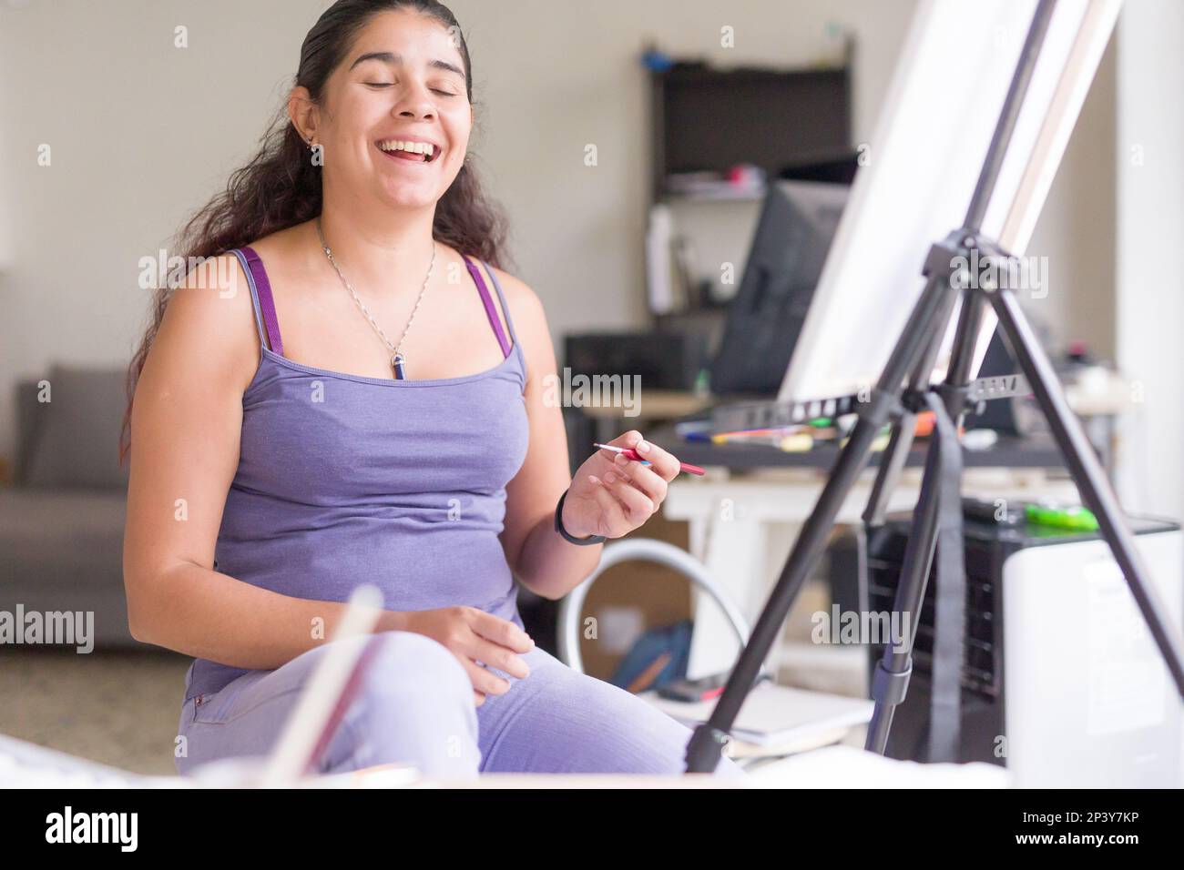 Painting at home, weekend leisure hobby. Happy smiling south american ...