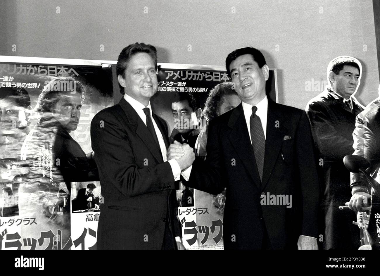 File- Japanese veteran actor Ken Takakura (R) and U. S. actor Michael ...