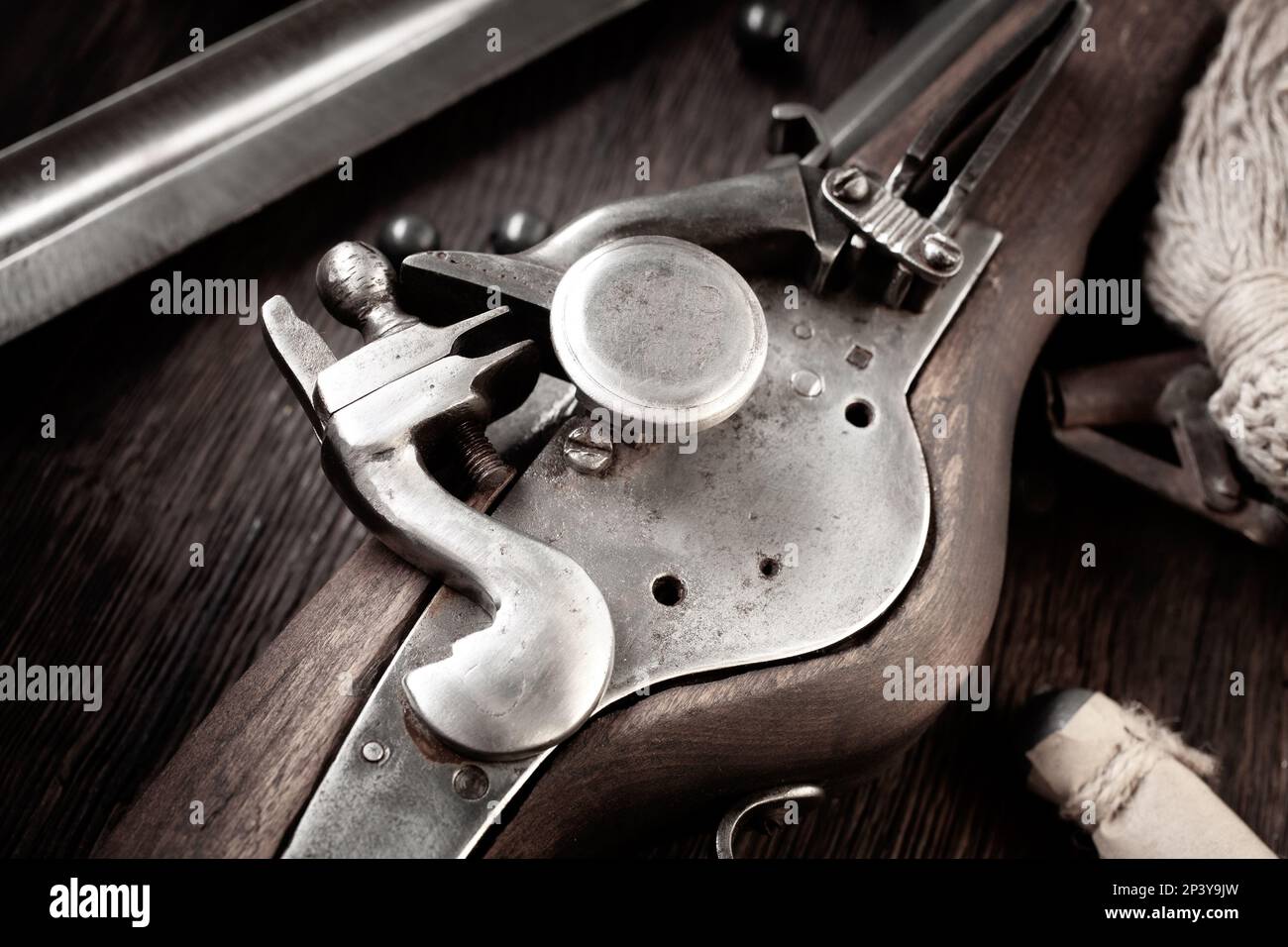 17th century ancient flintlock musket with powder flask and led bullets ...