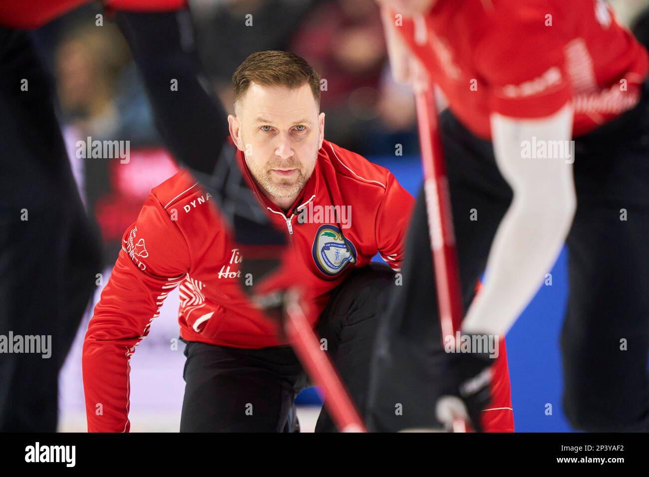 Team Canada skip Brad Gushue watches his shot during his match against ...