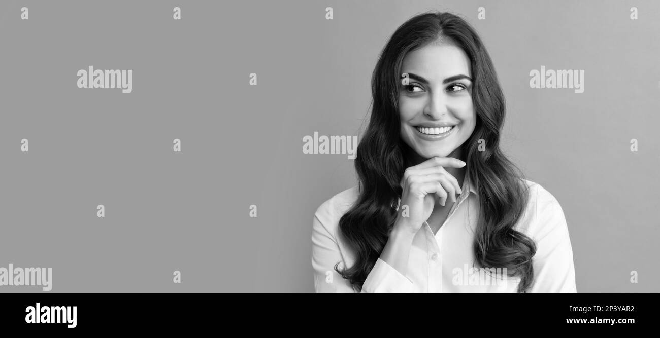 Thoughtful professional woman employee think smiling grey background ...