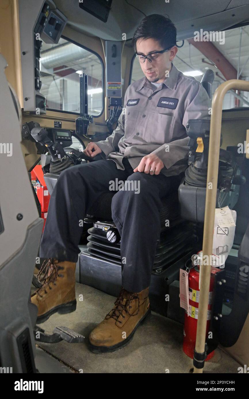 Francisco Lopez, a military technician assigned to the Area Maintenance ...