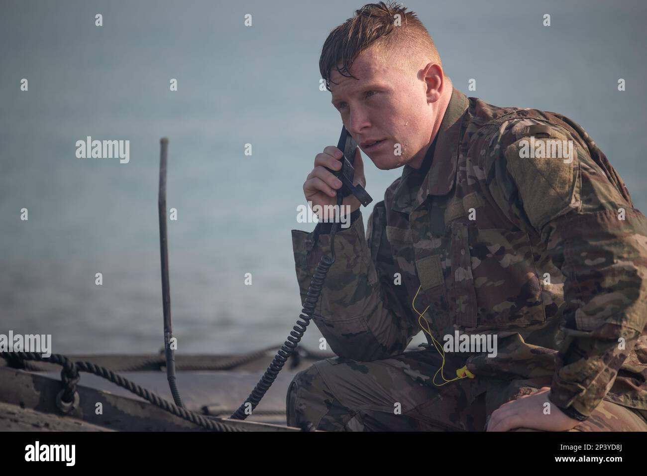 U.S. Army Soldier with the 511th Engineer Dive Detachment jumps into ...