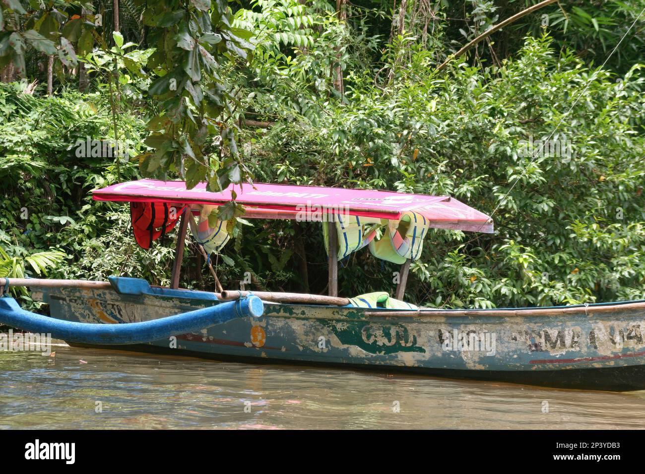 5-1-2009:Java,Indonesia: Boats houses and people on a river in ...